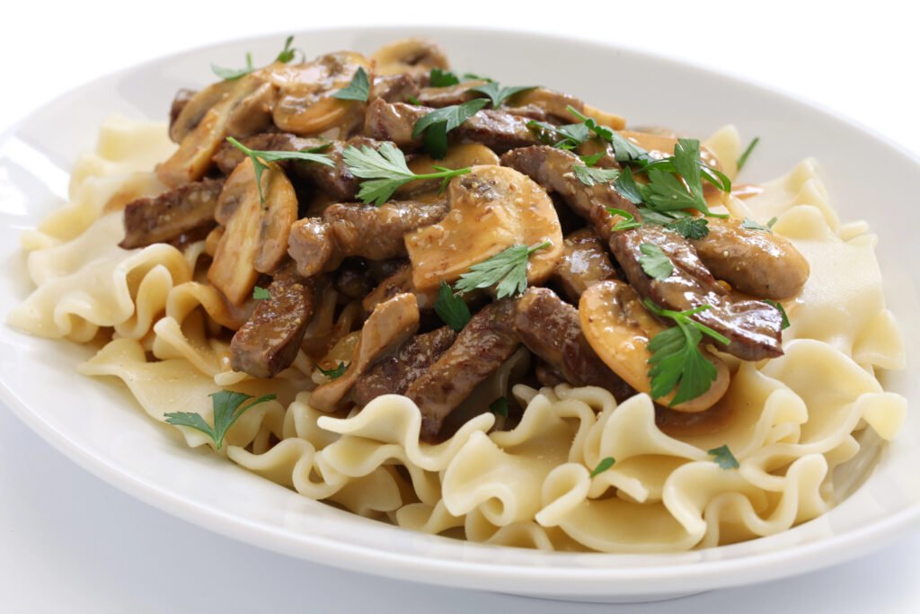Creamy Beef Stroganoff with Mushrooms and Onions - The Petite Chef